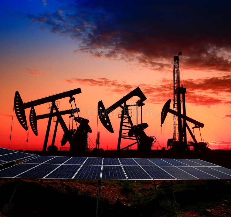 Oil pump with solar panels stock image. Image of green - 248868483