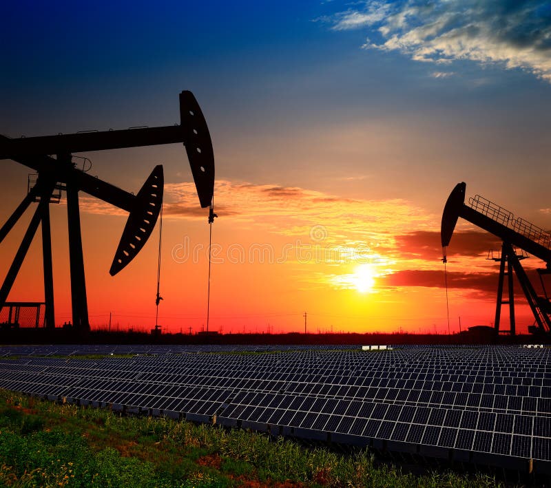 Oil pump with solar panels stock photo. Image of crude - 249415192