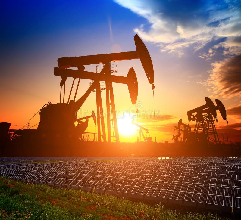 Oil pump with solar panels stock image. Image of crude - 263294325