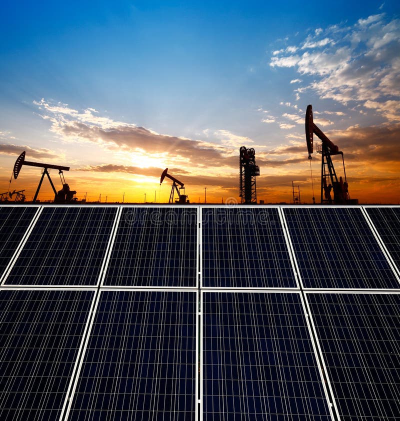 Oil pump with solar panels stock photo. Image of electrical - 276063664