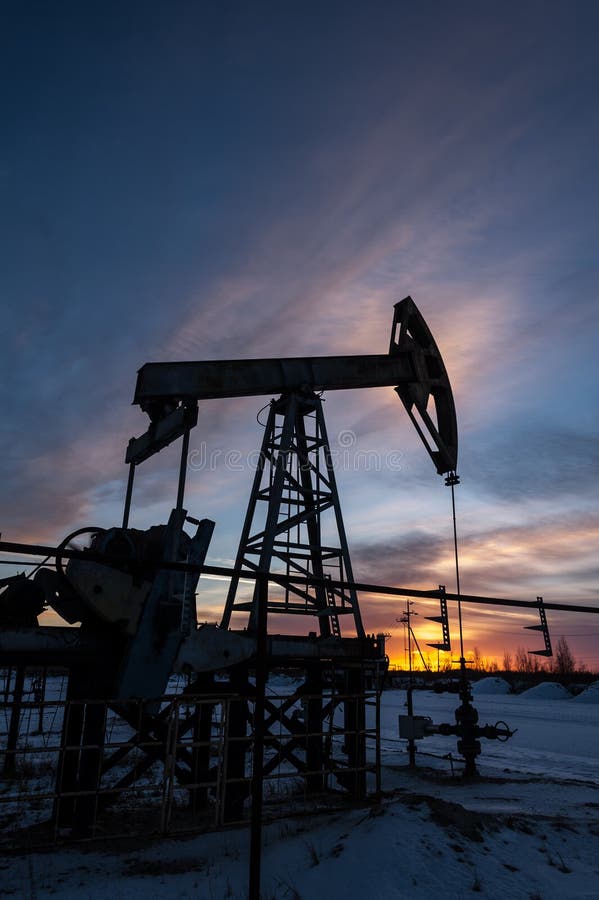 Oil Pump at Sunset Sky Background. Stock Image - Image of wellhead ...