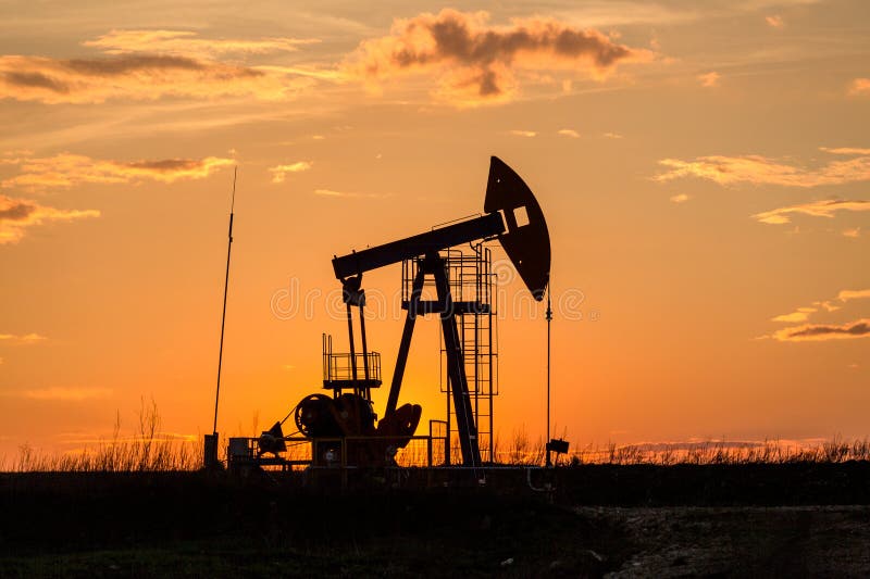 Oil pump at sunset stock photo. Image of fuel, drilling - 2223826
