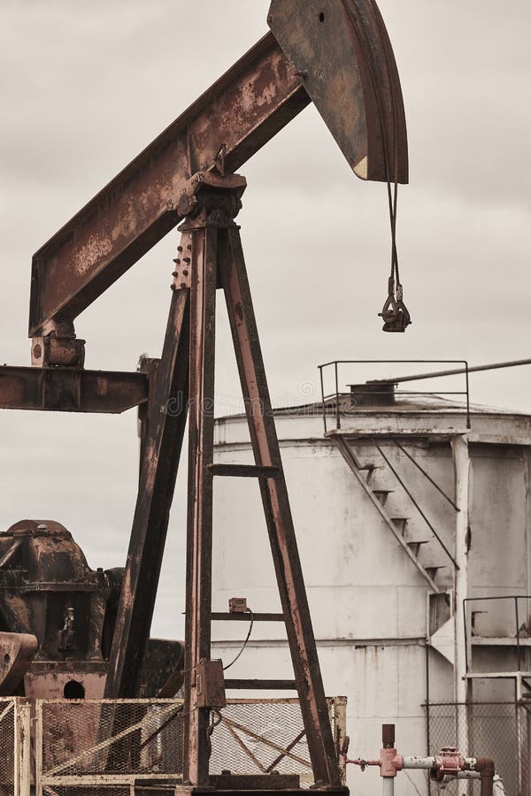 Oil Pumping Machine. Pump Jack. Petroleum Extraction. Global Warming ...