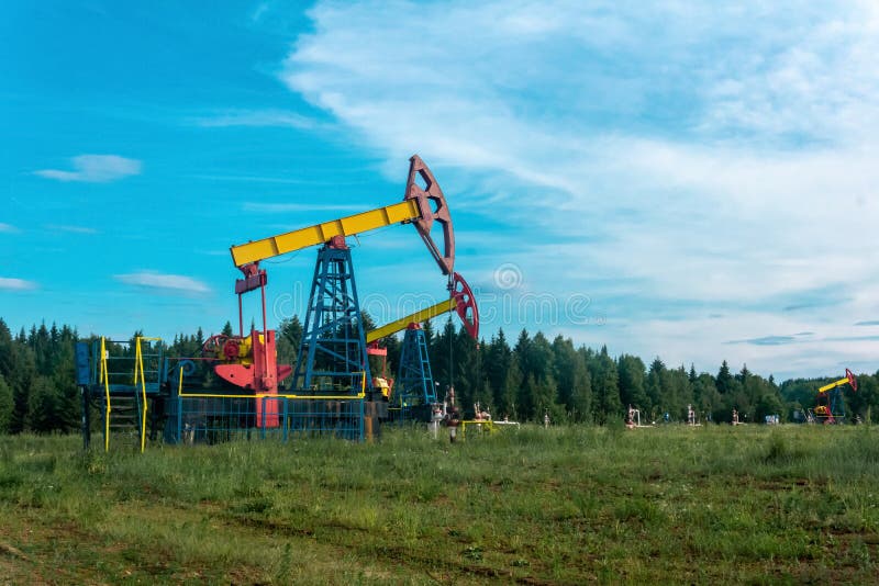 Oil Pumpjacks in a Clearing in the Forest Stock Image - Image of ...