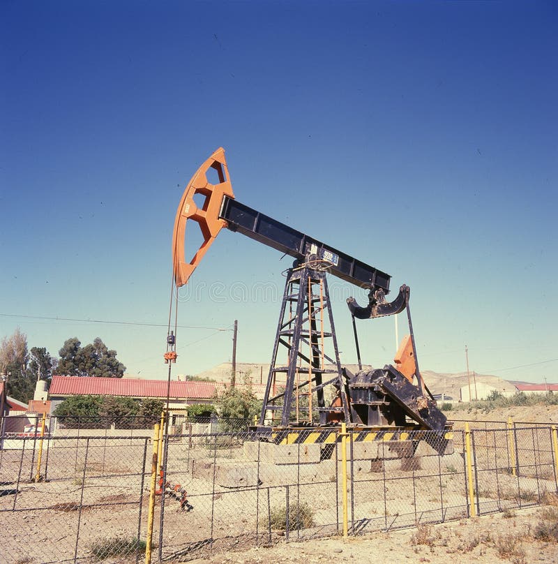 Oil Pumps are Running in the Sunset at the Oil Field Stock Image ...