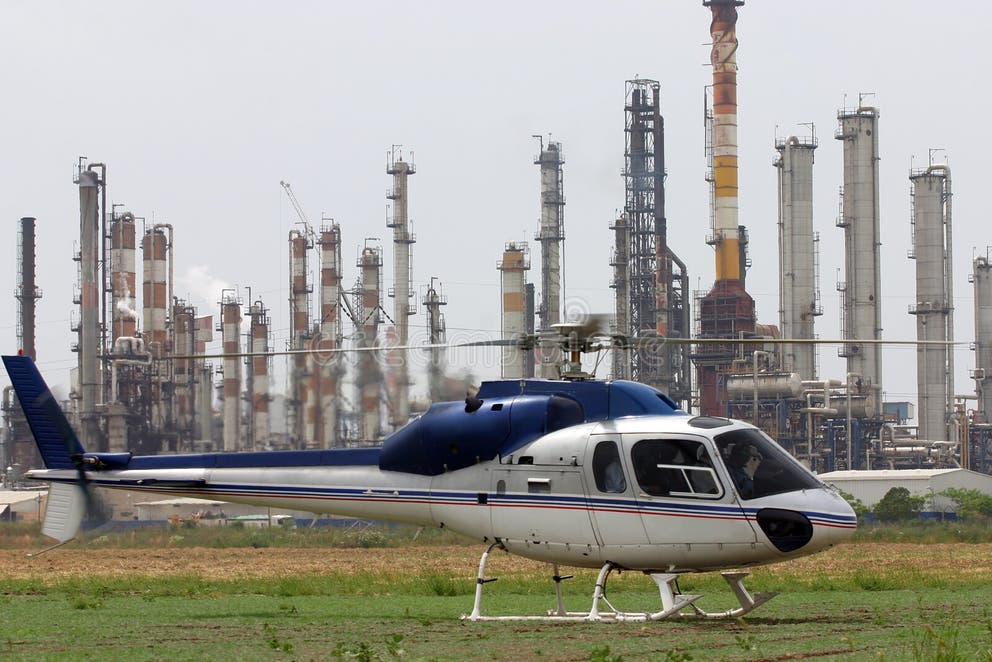 Oil Refineries & Helicopter Stock Image - Image of flight ...