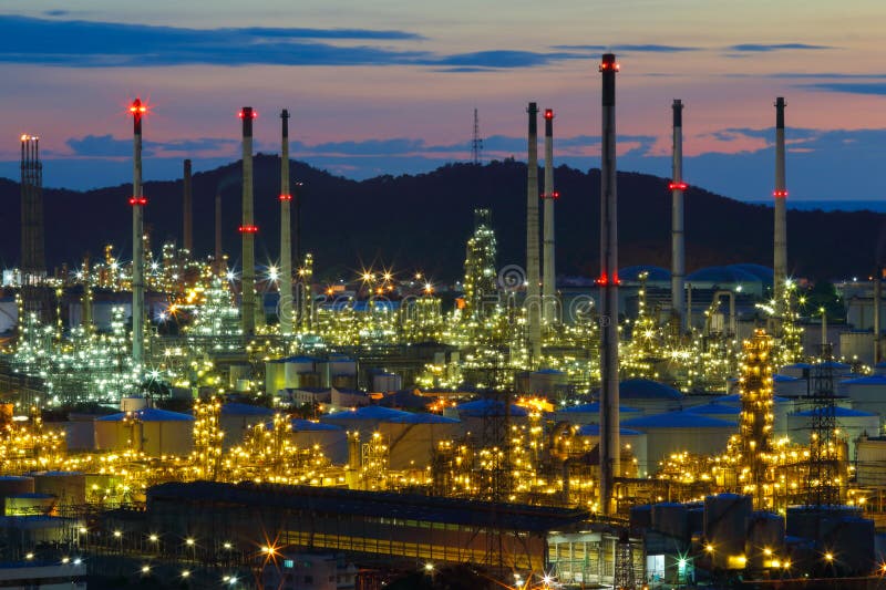 Oil Refinery with a Background of Mountains and Sky. Stock Image ...