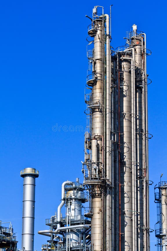 Oil Refinery (blue sky) stock image. Image of environment - 22012489