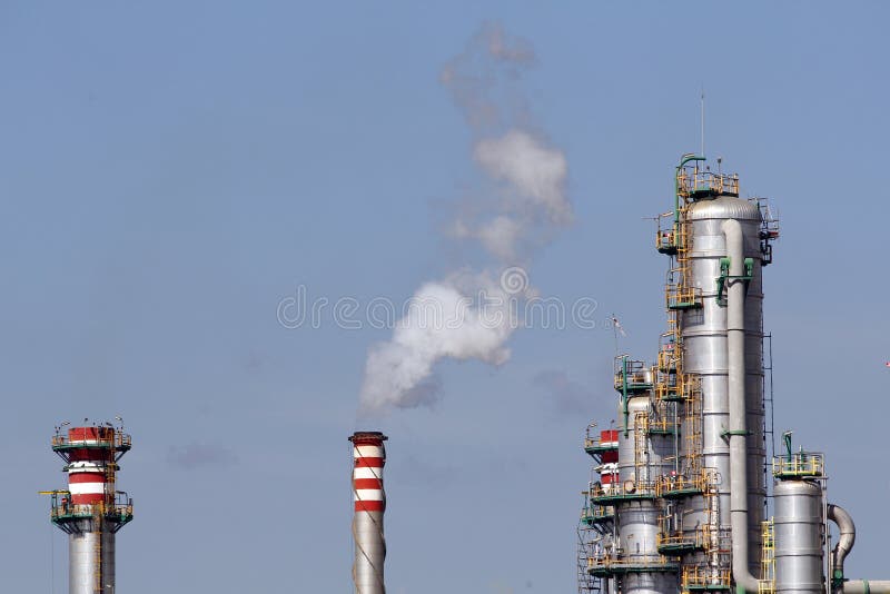 Oil refinery smoke stacks stock photo. Image of exhaust - 36157588