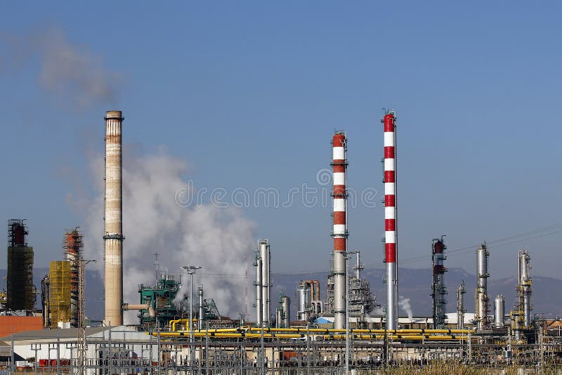 Oil refinery smoke stacks stock photo. Image of exhaust - 36157588