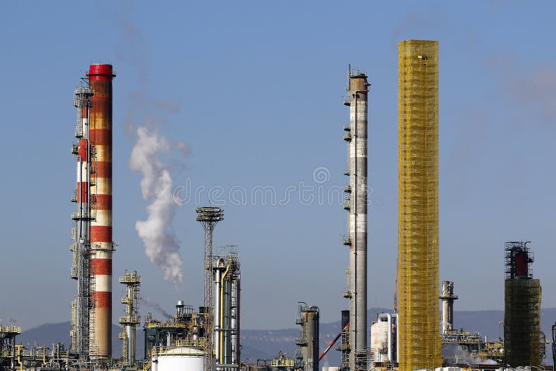 Oil refinery smoke stacks stock photo. Image of exhaust - 36157588