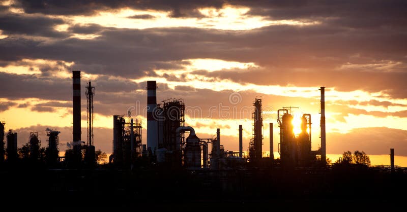 Oil refinery at sunset stock image. Image of petroleum - 20392709