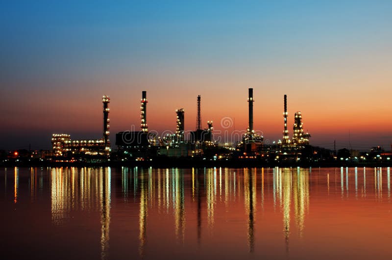 Oil refinery at sunset stock photo. Image of factory - 27465748