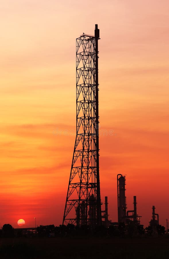 Oil refinery at sunset stock photo. Image of illuminated - 28506168