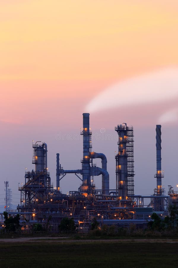 Oil refinery at sunset stock photo. Image of factory - 27465748