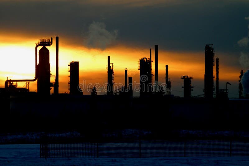 Oil refinery at sunset stock image. Image of tanks, petrochemicals ...