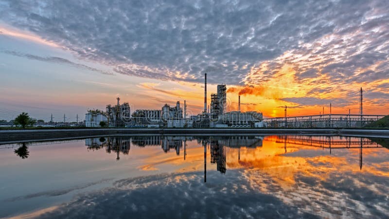 Oil refinery at sunset stock photo. Image of manufacturing - 1620022