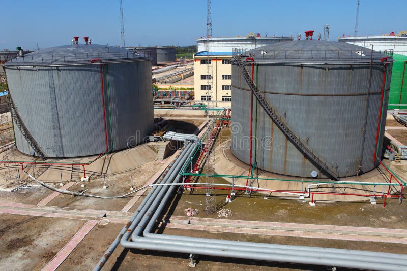 Oil Refinery Tanks stock photo. Image of fossil, corporation - 30610974
