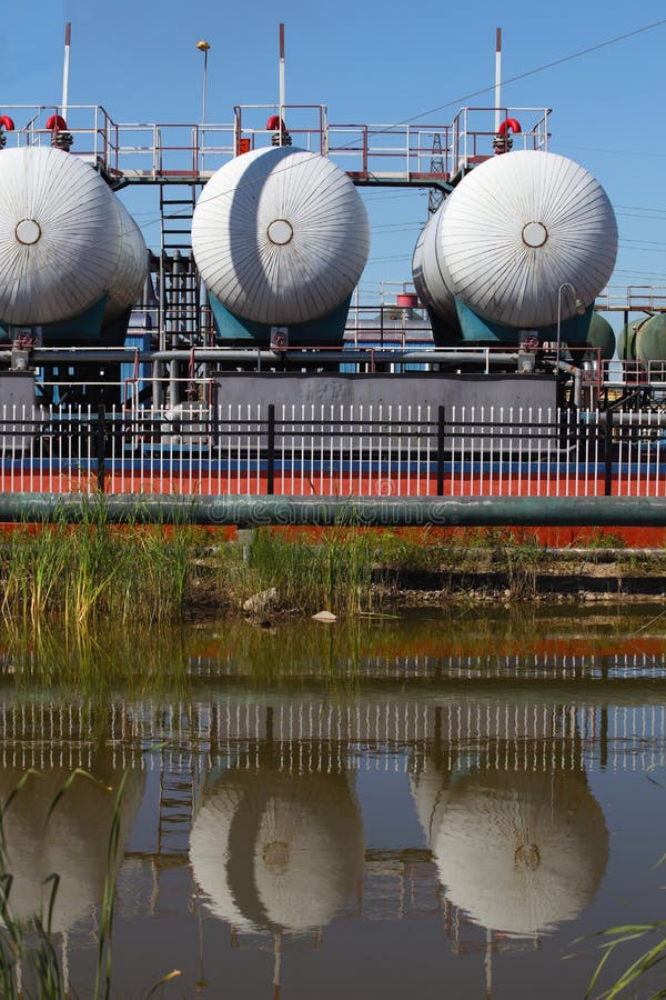 Oil Refinery Tanks stock photo. Image of corporation - 30611982