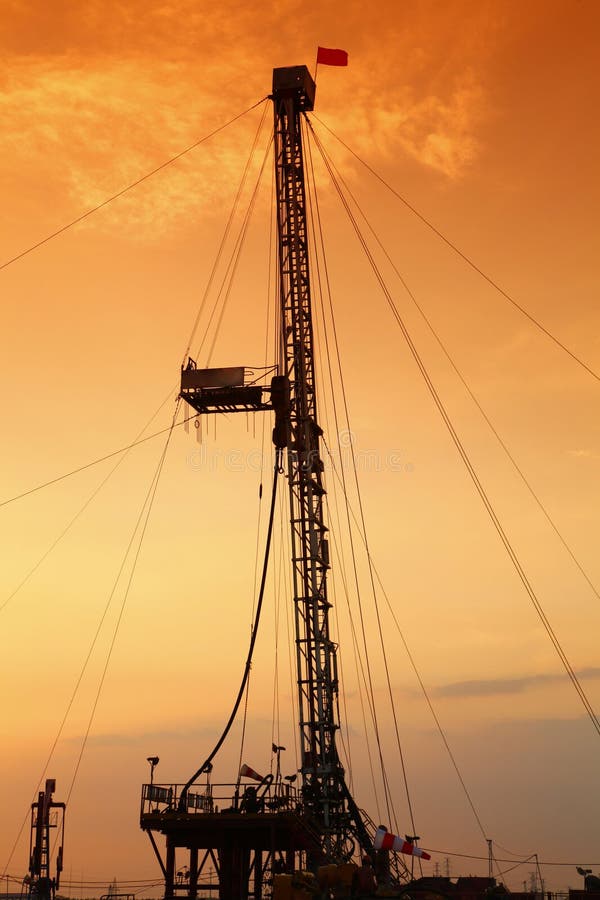 Oil rig stock photo. Image of orange, sunset, equipment - 311337612