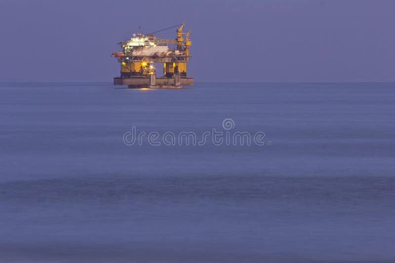 Oil rig night ocean stock image. Image of industry, night - 42806259