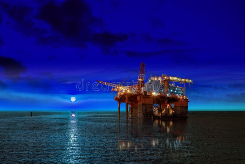 The Large Offshore Oil Rig Drilling Platform at Night Stock Photo ...