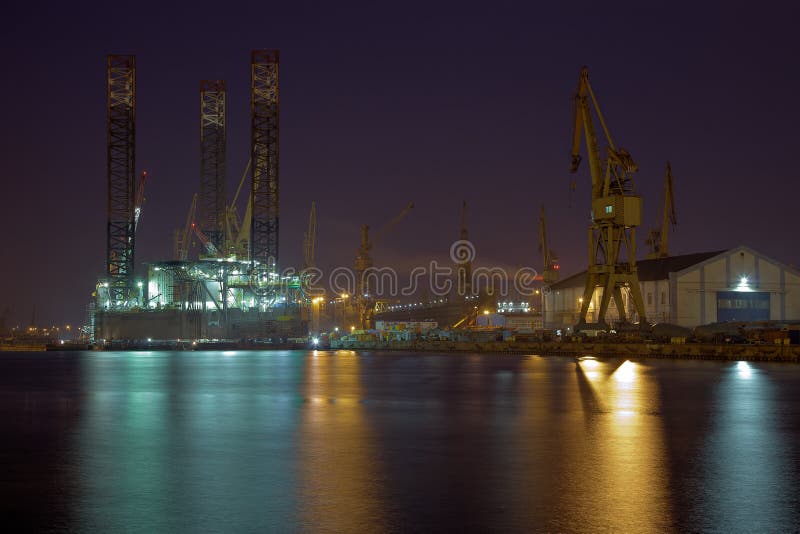 Oil rig in the yards stock photo. Image of equipment - 16236504
