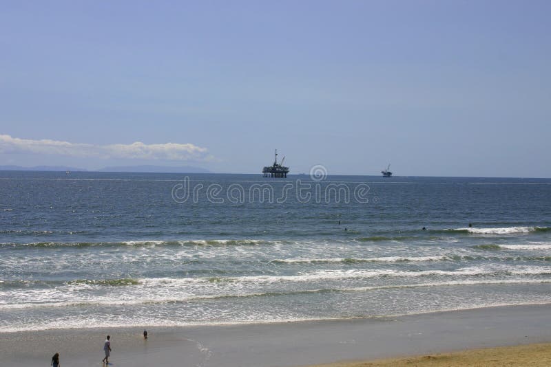 Oil rigs and beach stock image. Image of fuel, pollution - 705765