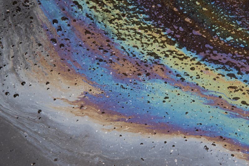 Oil Slick on the Asphalt Road Background Drains into the Storm Drain ...