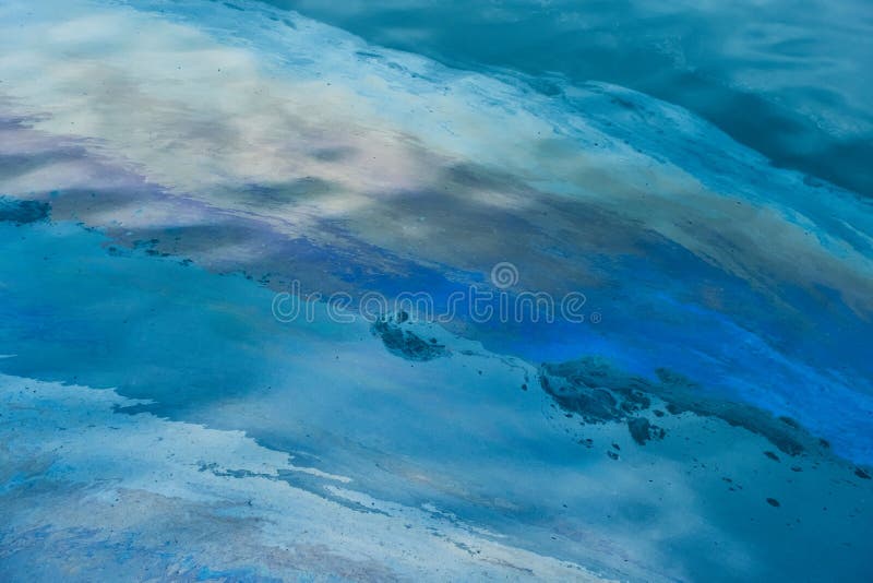Oil spill in water stock photo. Image of slick, damage - 120927370