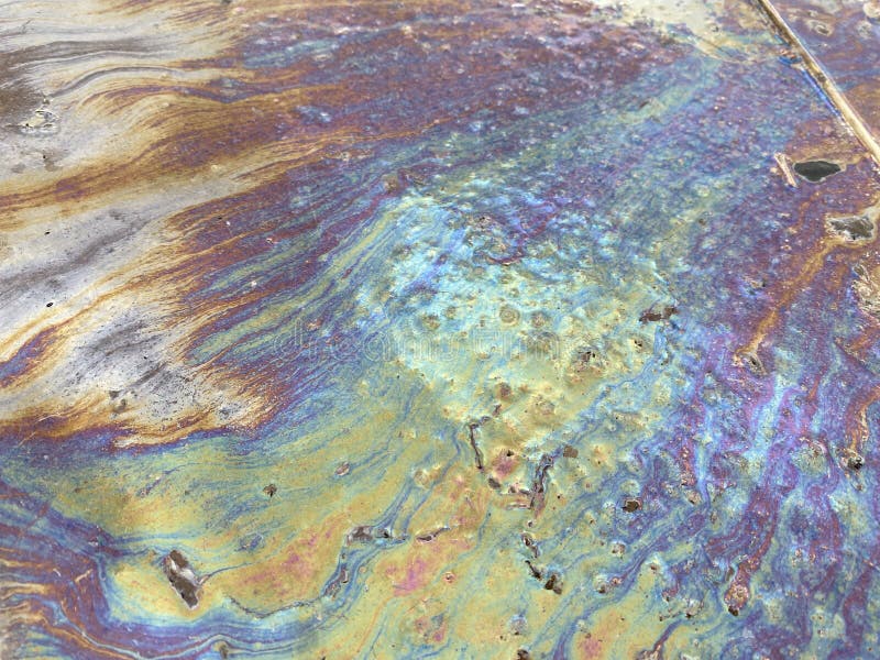 Oil spills on the sand stock image. Image of blob, beach - 220401715