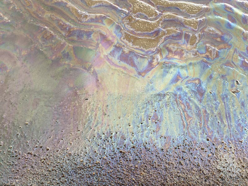 Oil spills on the sand stock image. Image of blob, stain - 220402463