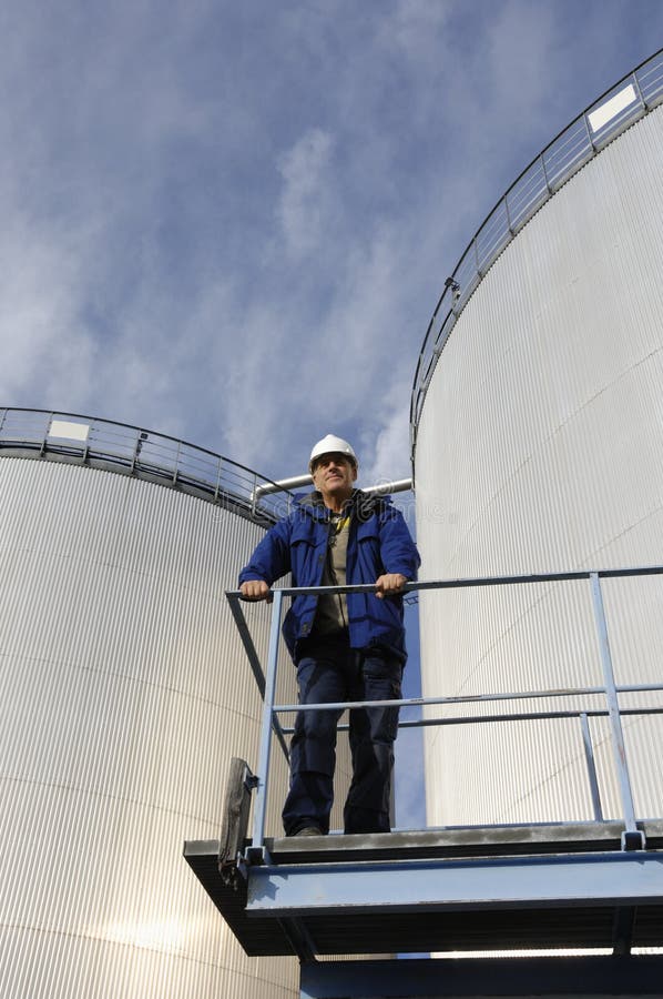 Oil storage and engineer stock image. Image of fuelstorage - 3439763