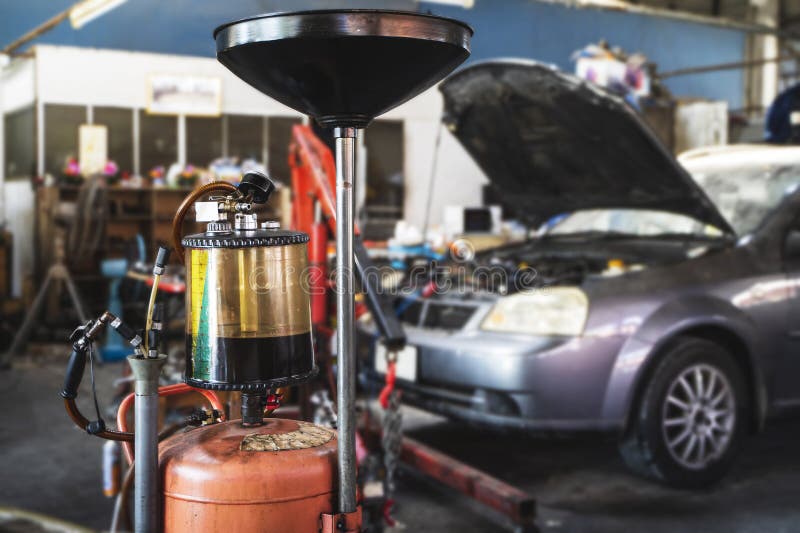 Oil Suction Machine in Garage Stock Photo - Image of industry, auto ...