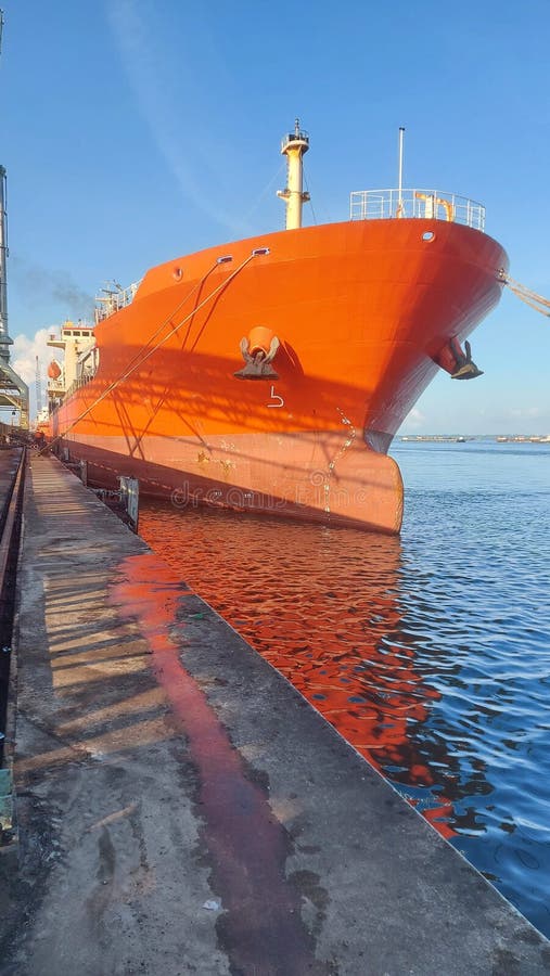 The Oil Tanker Berthed at Jetty Area for Crude Transferring. Stock ...
