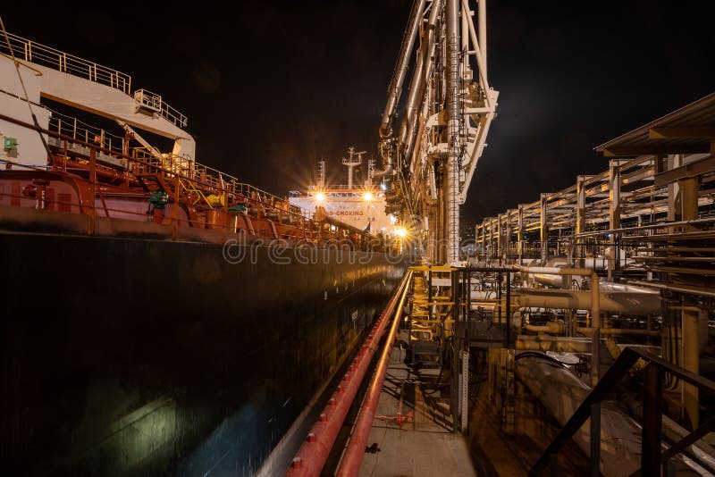 Oil tanker loading editorial stock image. Image of barrel - 238331999