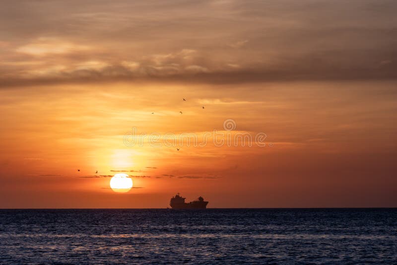 Oil Tanker Ship at Sunset in the Sea Stock Image - Image of anchored ...