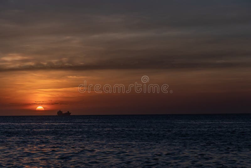 Oil Tanker Ship at Sunset in the Sea Stock Image - Image of anchored ...