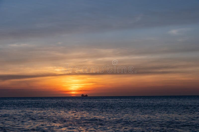 Oil Tanker Ship at Sunset in the Sea Stock Image - Image of anchored ...