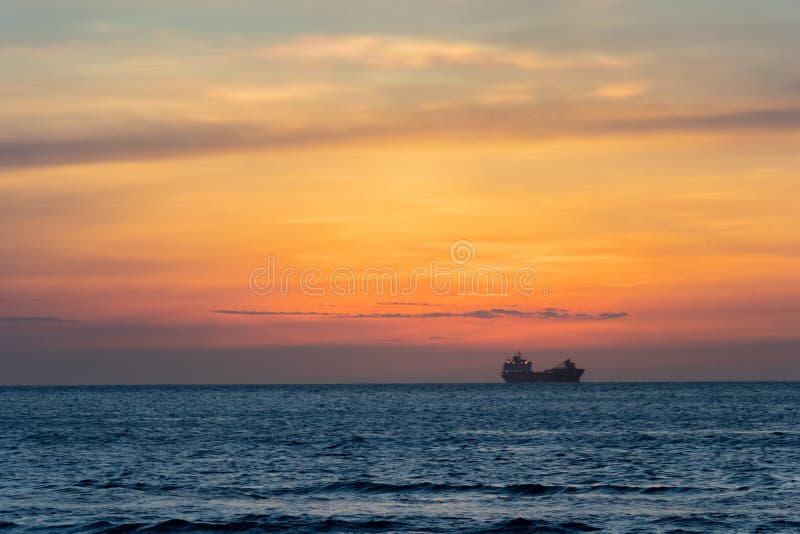 Oil Tanker Ship at Sunset in the Sea Stock Image - Image of cloud, boat ...