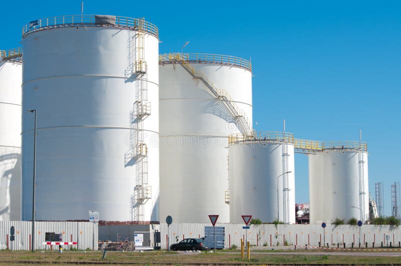 Two Metallic Round Chemical Storage Tanks Stock Photo - Image of blue ...