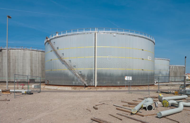 Grey oil tanks stock image. Image of pipelines, money - 2151883