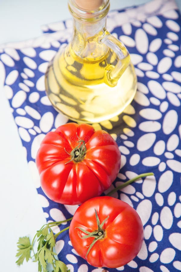 Oil with tomatoes stock photo. Image of food, plate, gourmet - 55194576