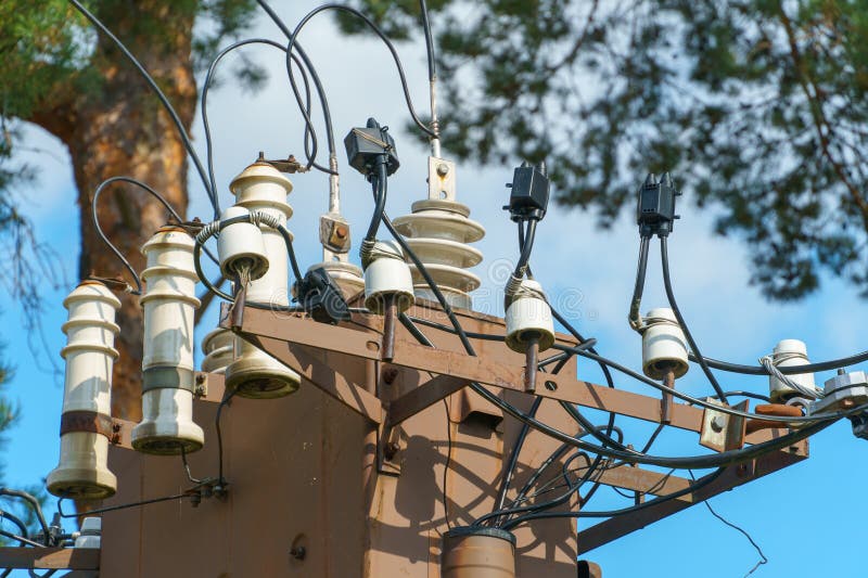 An Oil Transformer and Power Lines in the Forest. the Support of an ...