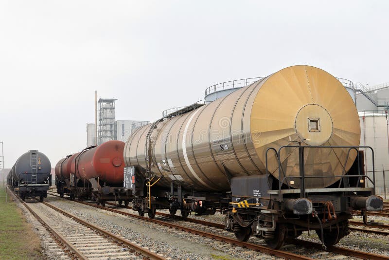 Oil Refinery With Train Fuel Tankers Stock Image - Image of chemical ...