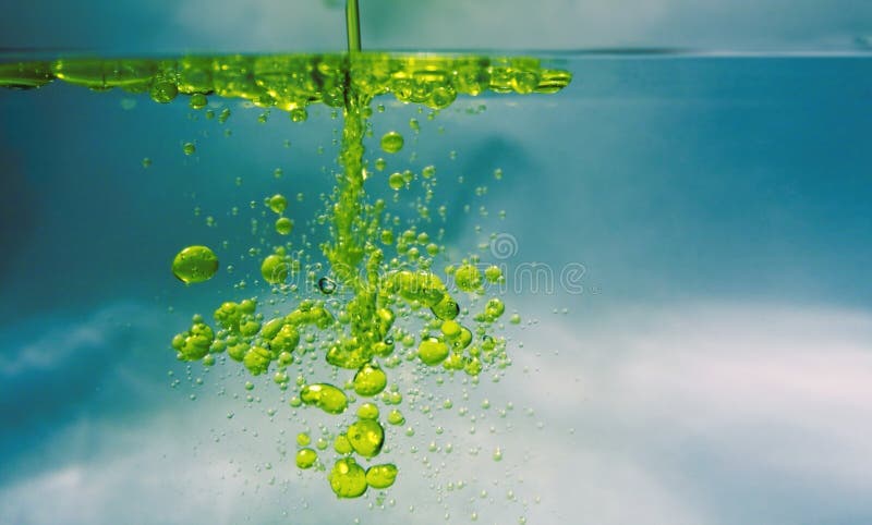 Oil in water stock photo. Image of macro, waves, splash - 5581852