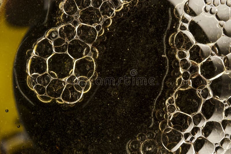 Oil and Water Patterns Randomly Created Due To Oil Being Lighter Than ...