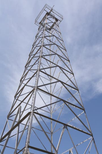 Oil Well Derrick with Clouds Stock Photo - Image of structure, tall ...