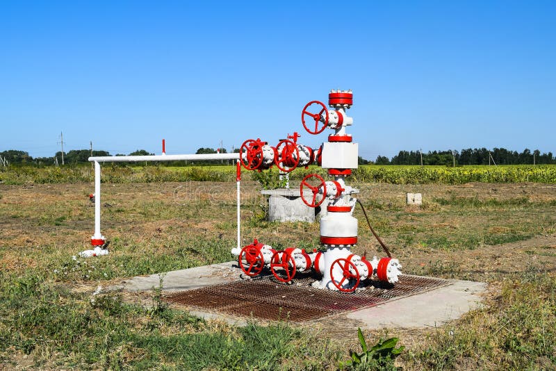 Oil Well in the Field, Painted in White and Red. Oil with Modern ...