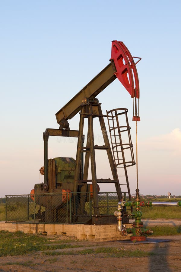 Oil well on the medow stock image. Image of blue, crude - 74788809